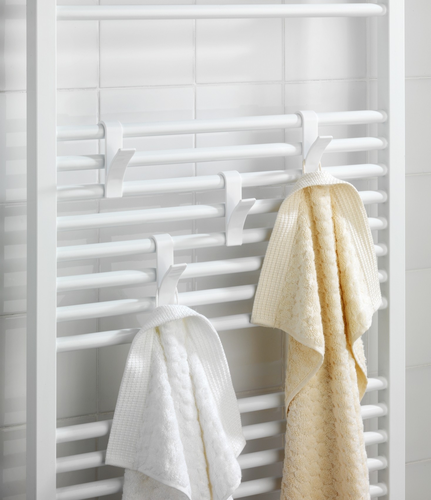 Set 2 carlige pentru prosoape, Zola®, prindere calorifer, din plastic ...